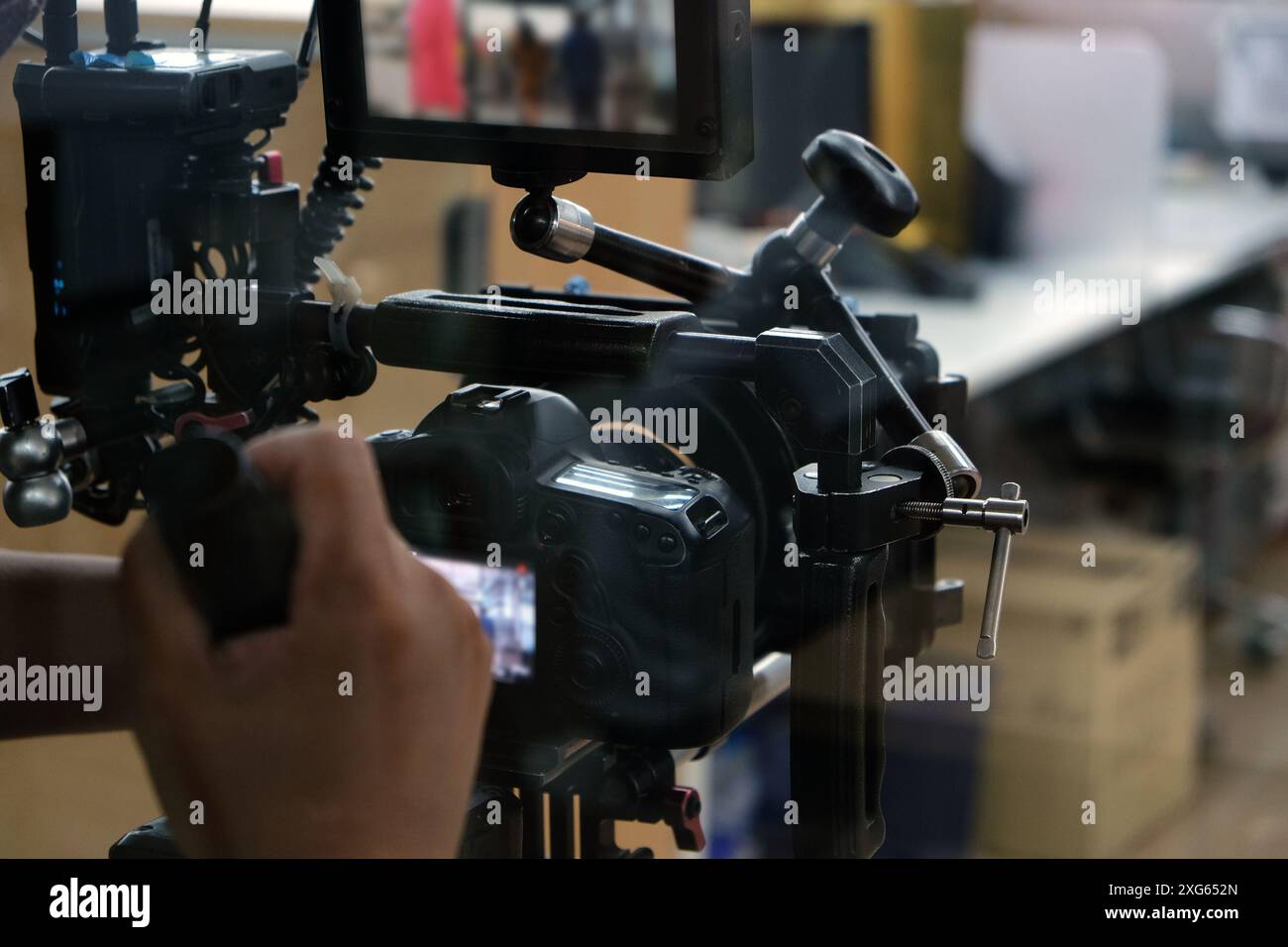 Behind the scenes of a movie. Film crew working in a studio Stock Photo ...