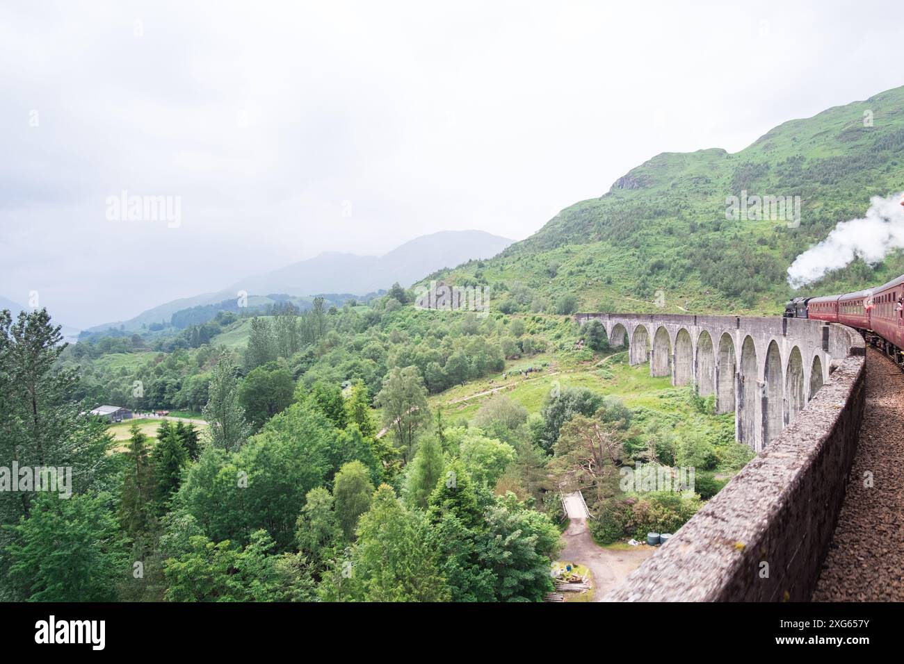 Jacobite Steam Train Locomotive passing Glenfinnan Viaduct Stock Photo ...