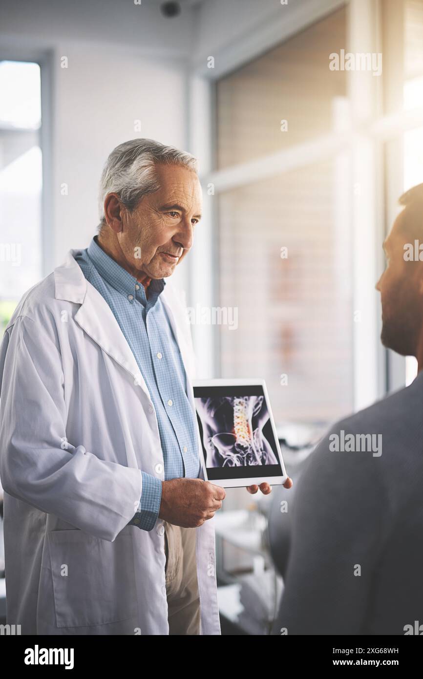 Medical, doctor and patient with tablet for xray consultation with ...