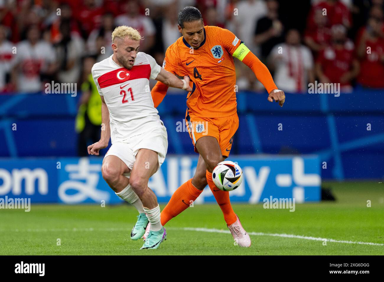 Berlin, Germany. 07th July, 2024. Bar?? Alper Y?lmaz of Türkiye and Virgil van Dijk of ...