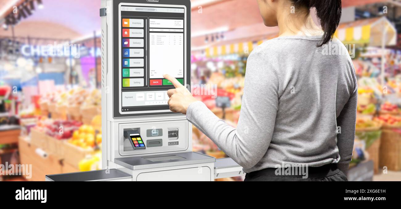 Customer use self-checkout kiosk or self-service payment machine in ...