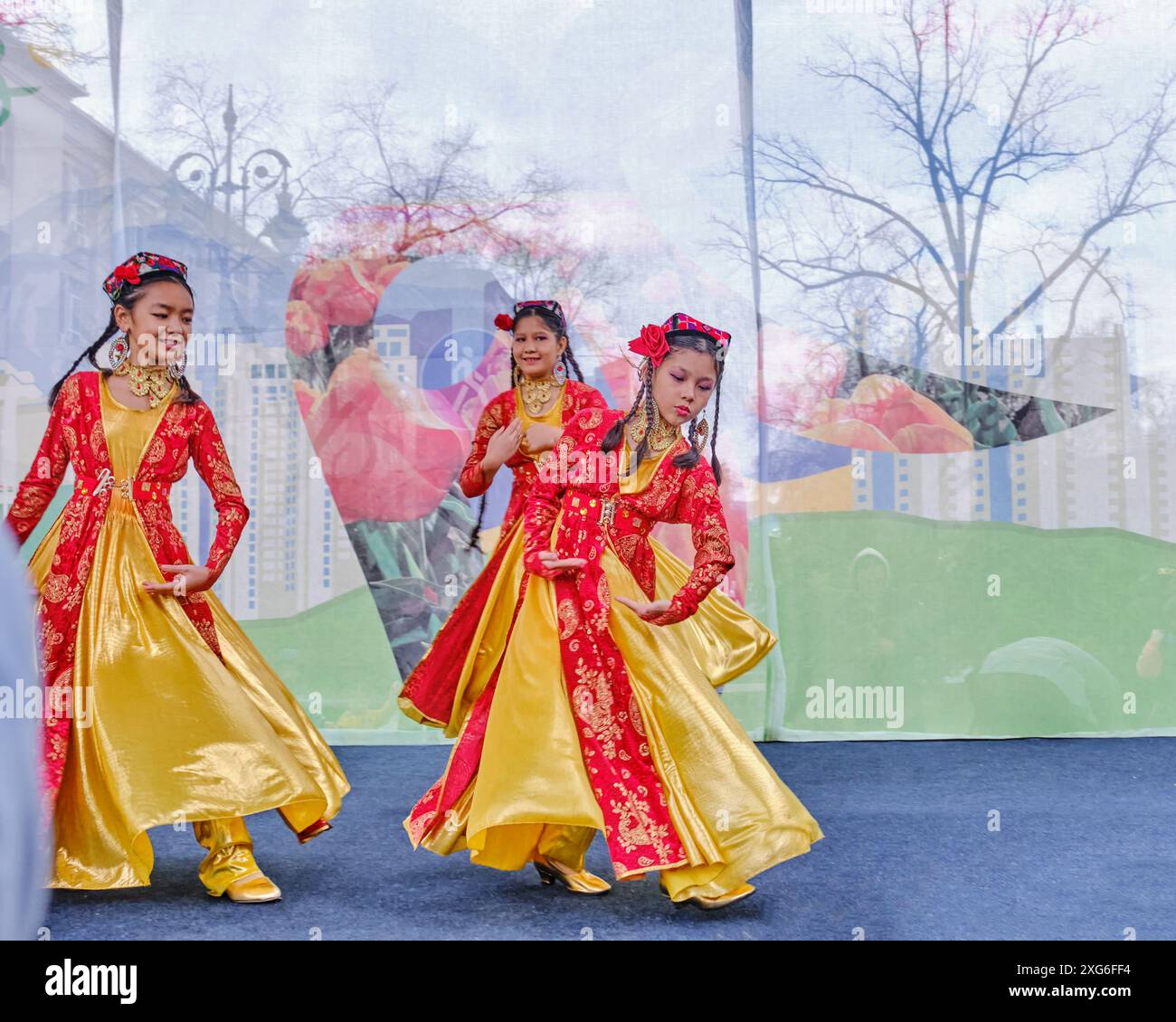 Almaty, Kazakhstan - March 21, 2024: Cute Asian small girls in national ...