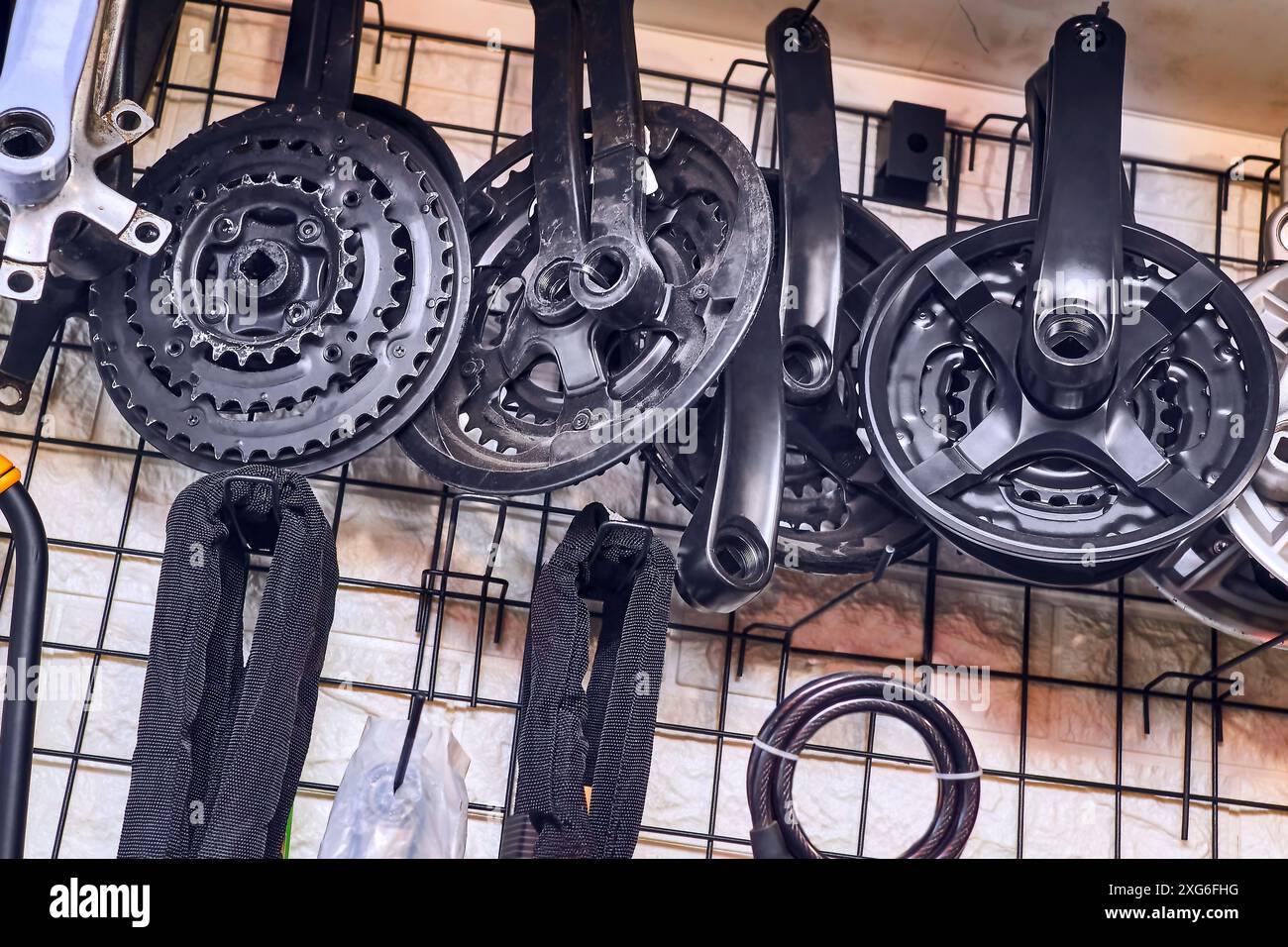 each of several projections on the rim of a wheel that engage with the ...