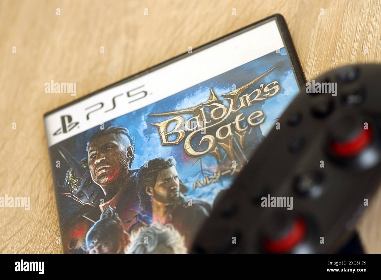 KYIV, UKRAINE - JUNE 26, 2024 Baldur's Gate 3 PS5 video game disc box ...