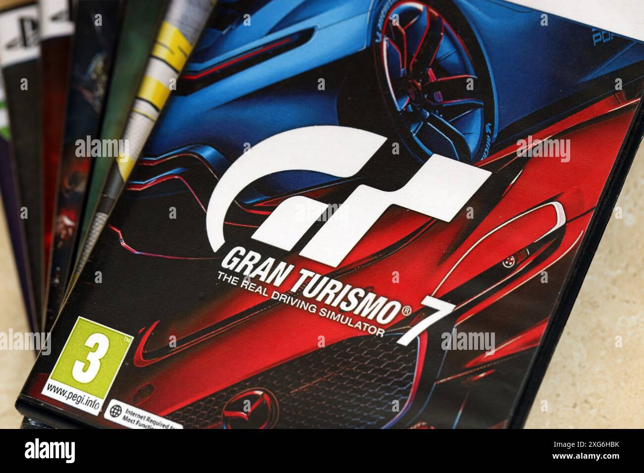 KYIV, UKRAINE - JUNE 26, 2024 Gran Turismo 7 PS5 video game disc box ...