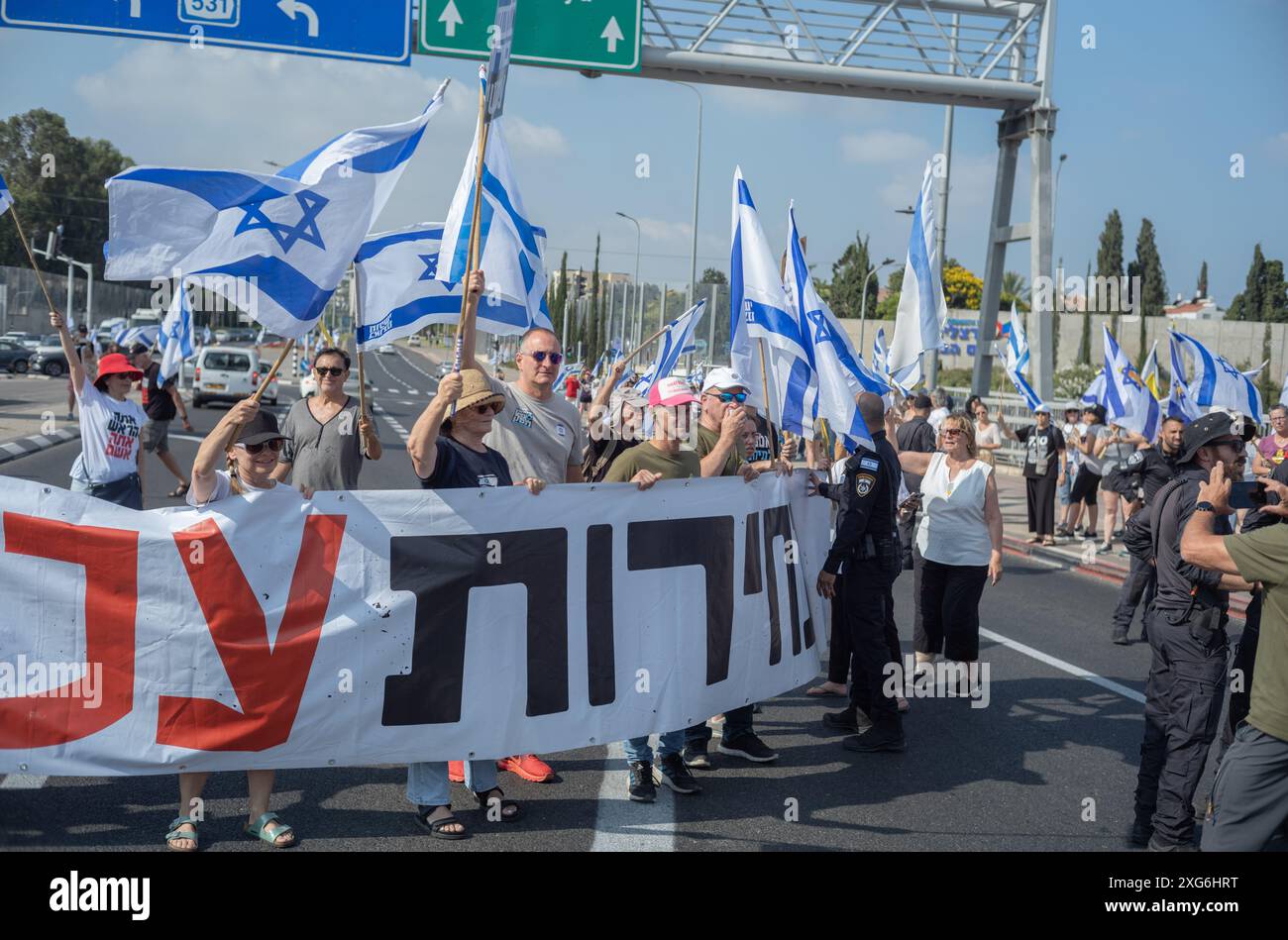 Raanana, Israel. 07th July, 2024. Israeli protesters shout slogans and ...