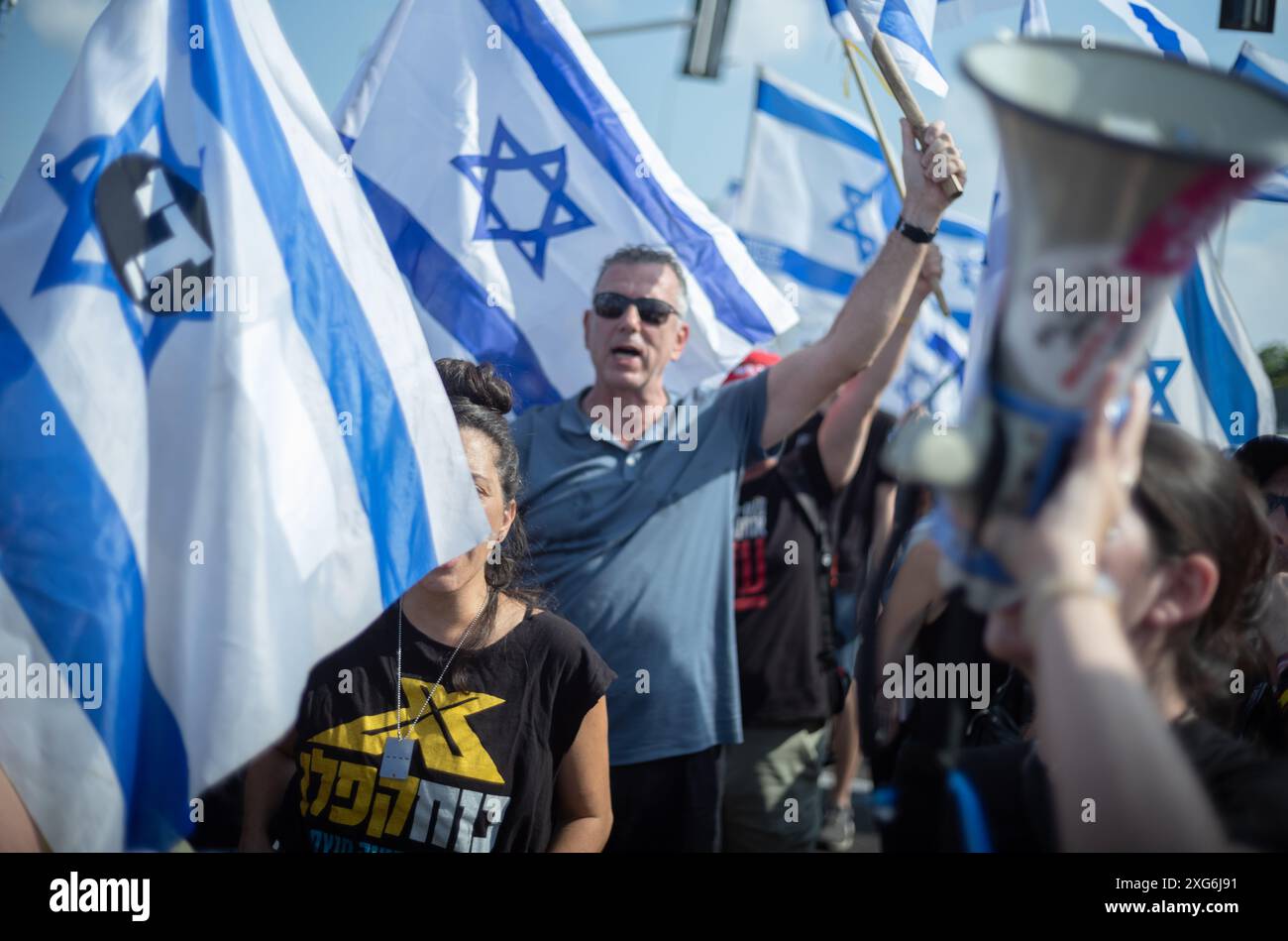 Raanana, Israel. 07th July, 2024. Israeli protesters shout slogans and ...