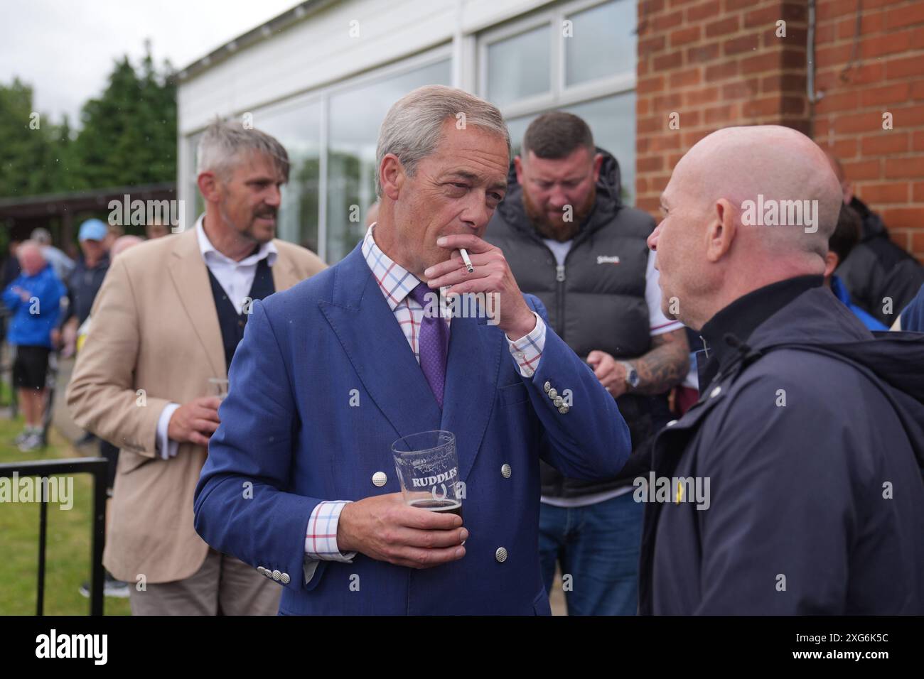 Reform UK leader Nigel Farage (left) at the inaugural match of East ...