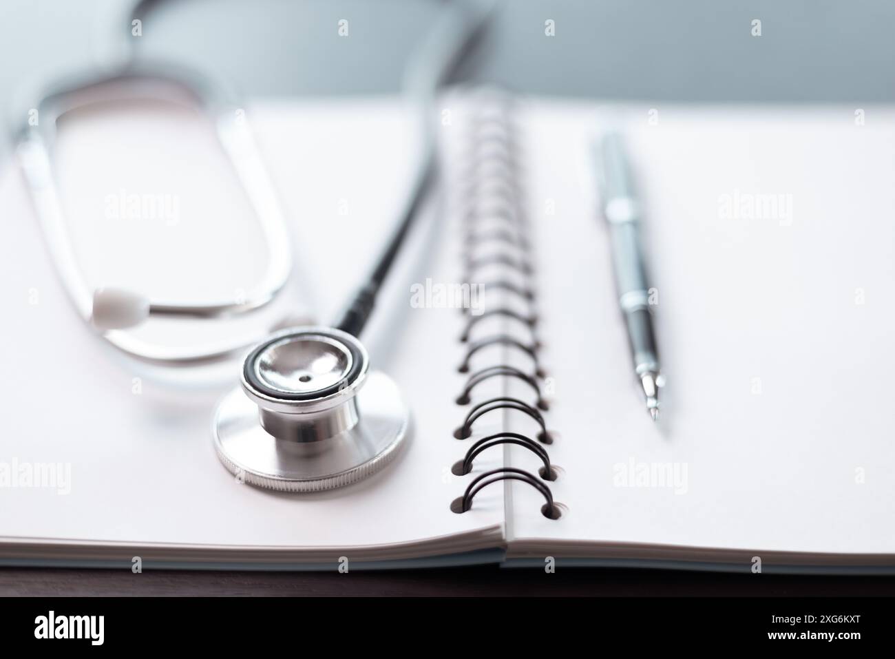 Surrounded by medical books and equipped with stethoscope, embodying ...