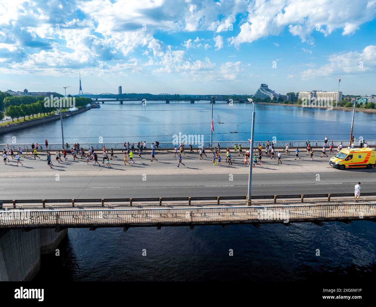 Aerial View of Marathon Runners Crossing Bridge in Riga, Latvia Stock ...