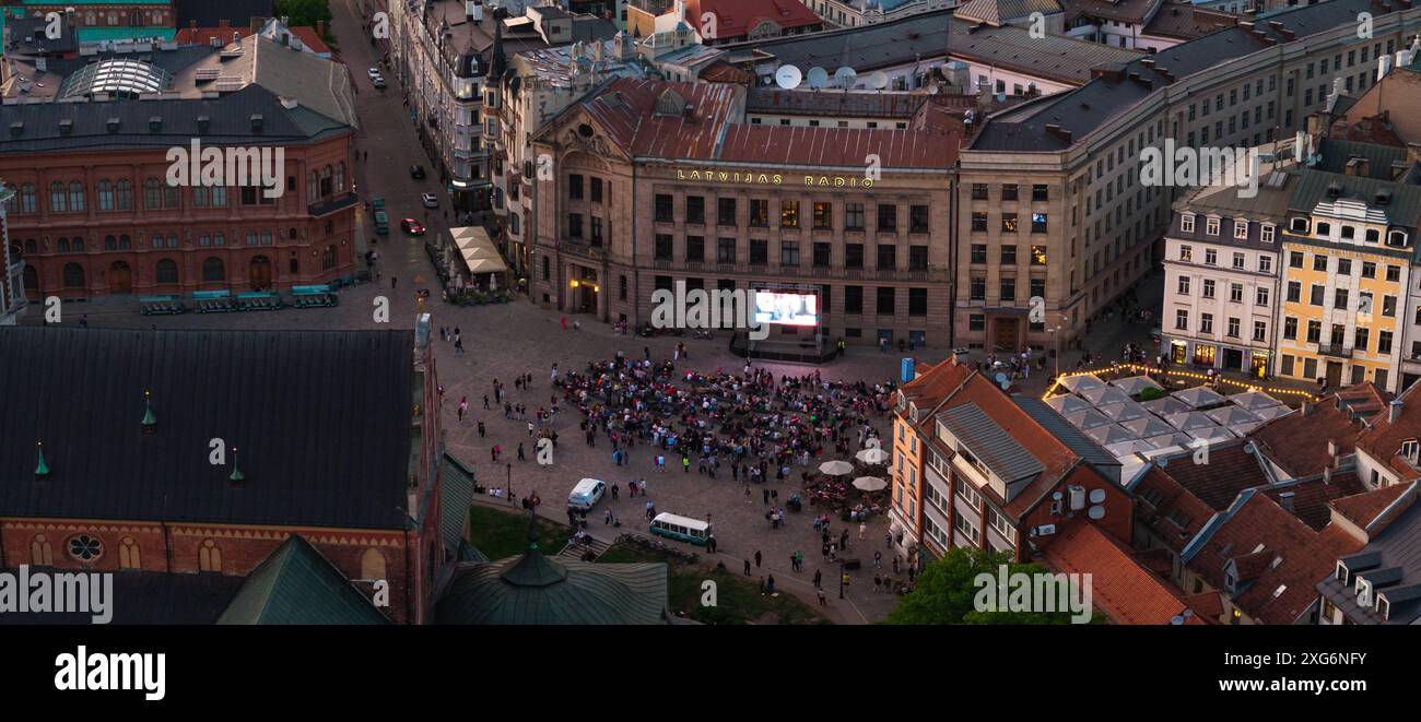 Aerial View of a Large Crowd in European City with Brick Buildings ...