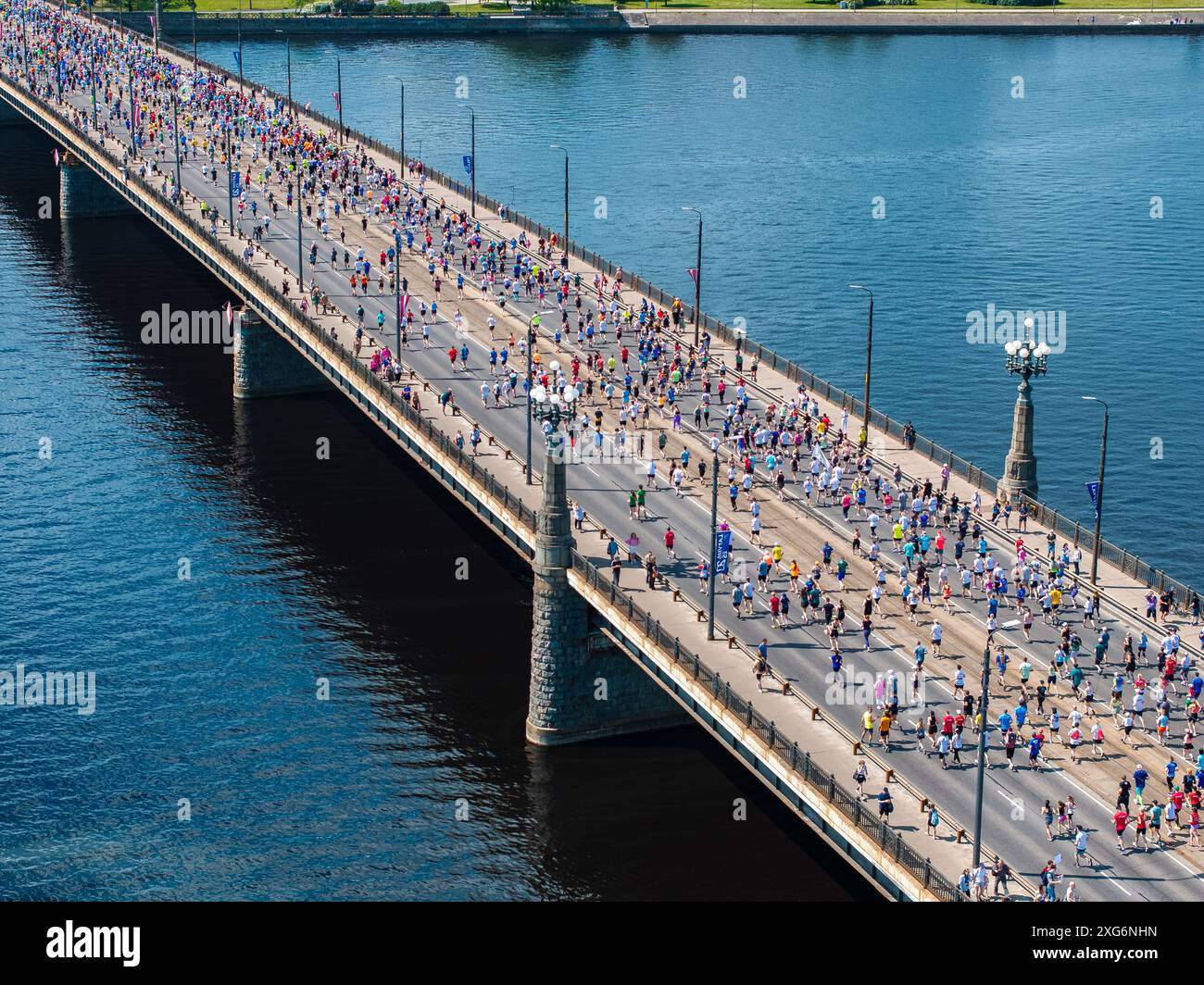 Aerial View of Marathon Runners on Stone Bridge in Riga, Latvia Stock ...