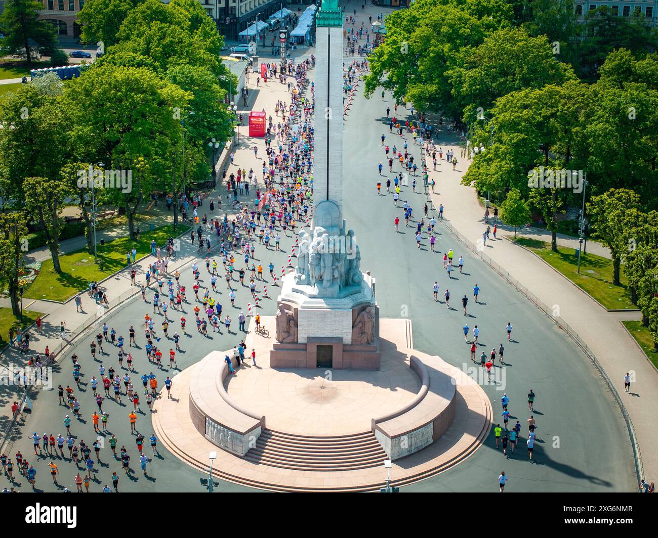 Aerial View of Marathon Runners Passing the Freedom Monument in Riga ...
