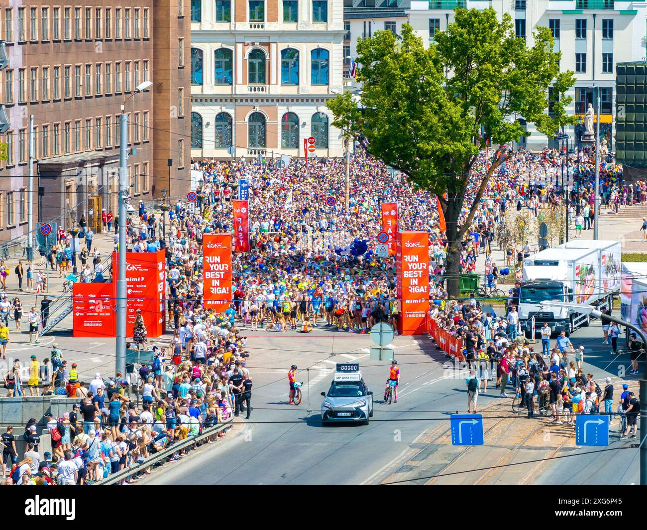 Aerial View of Runners in Riga Rimi Marathon 2024 with City Landmarks ...