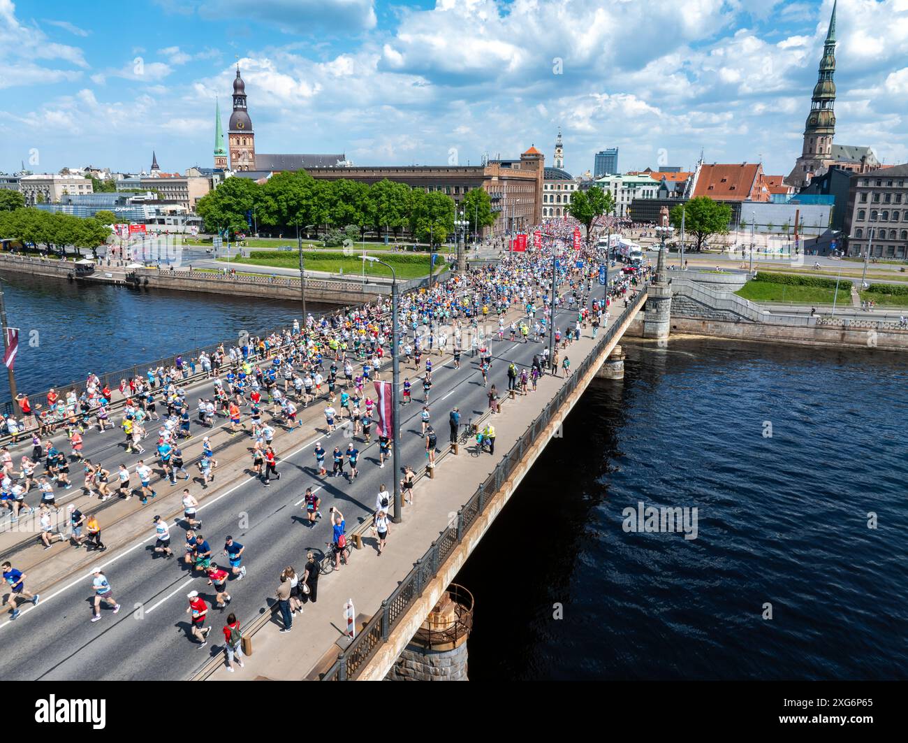 Aerial View of Marathon Runners Crossing Bridge in Riga, Latvia Stock ...