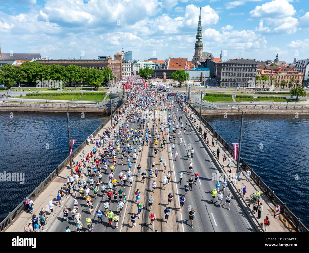 Aerial View of Marathon Runners Crossing Bridge in Riga, Latvia Stock ...