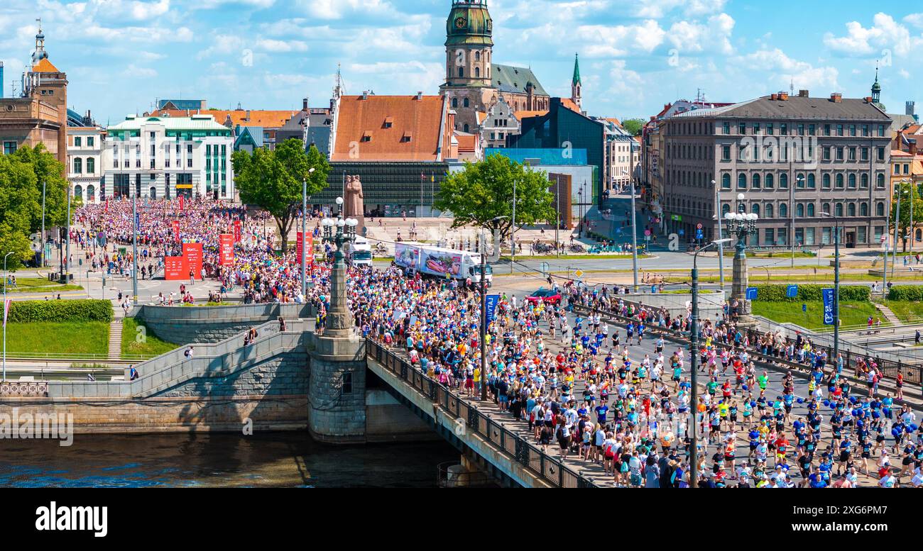 Aerial View of Marathon Runners Crossing a Bridge in Riga, Latvia Stock ...
