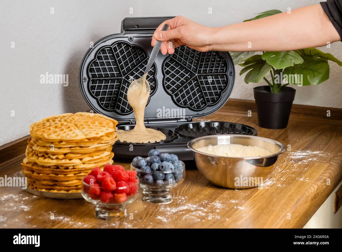 Woman hand making blueberry heart hi-res stock photography and images ...