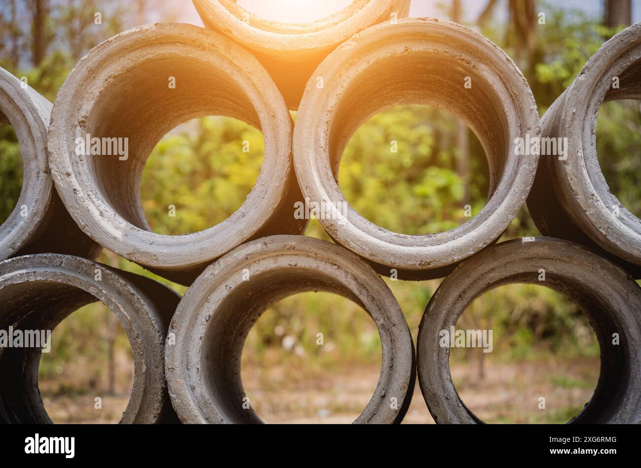 A stack of concrete ring pipes piled and creating a symmetrical ...