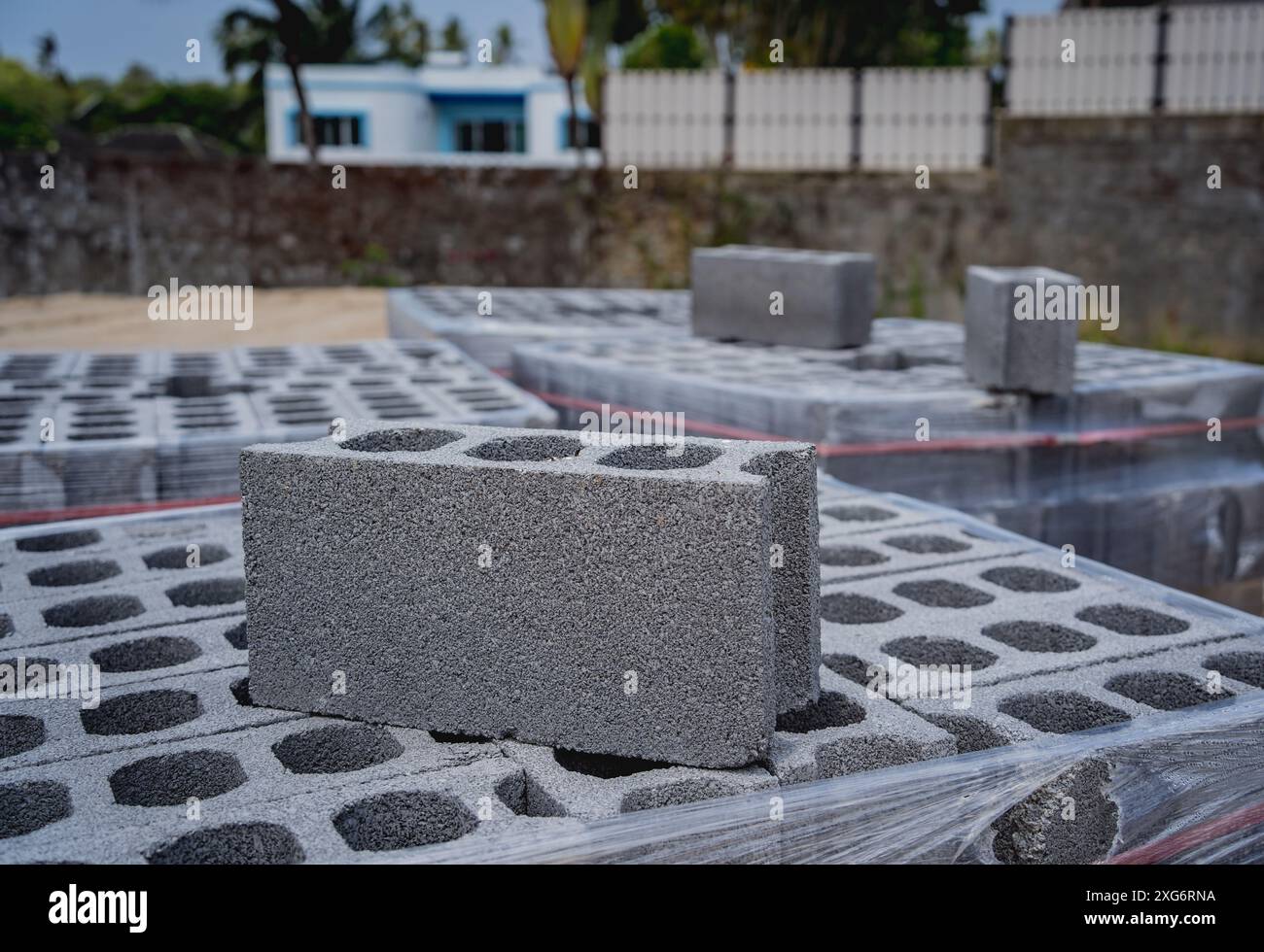 Concrete blocks with holes stacked on top of each other Stock Photo - Alamy