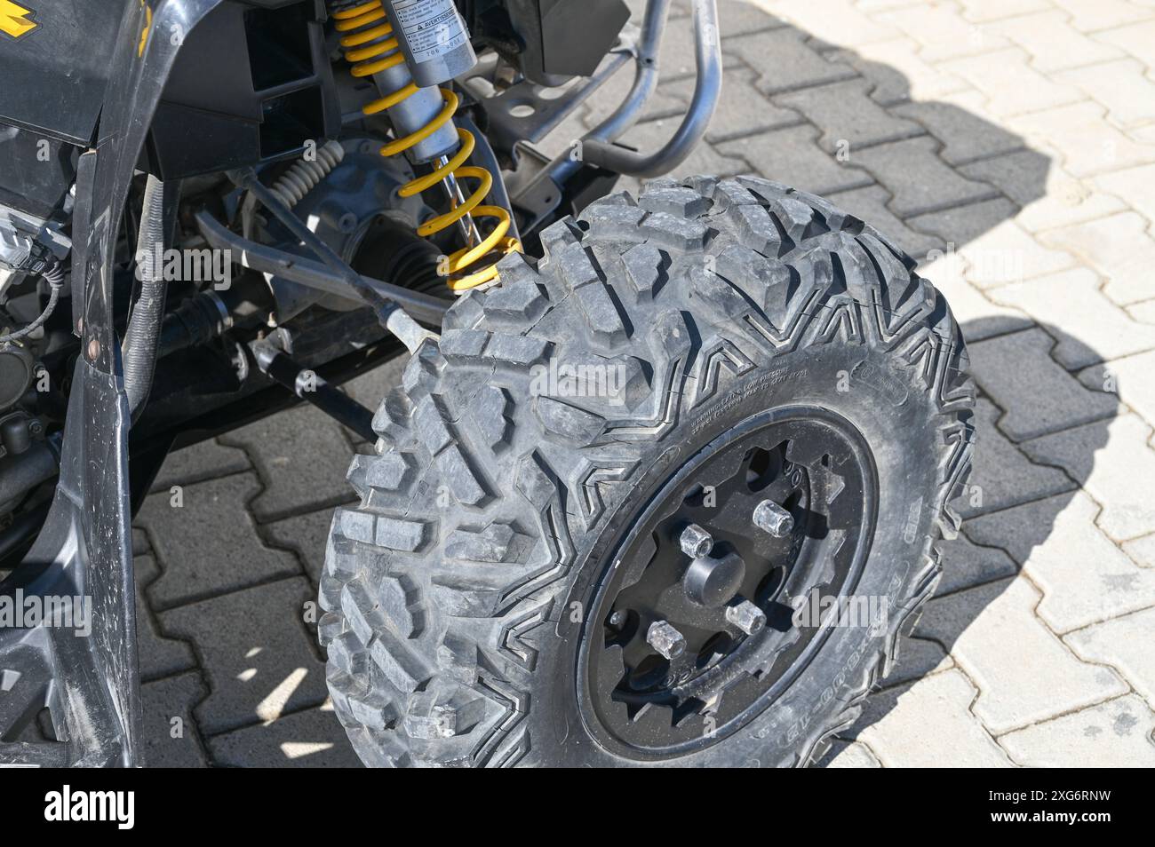 ATV rear suspension springs and shock absorbers 3 Stock Photo - Alamy
