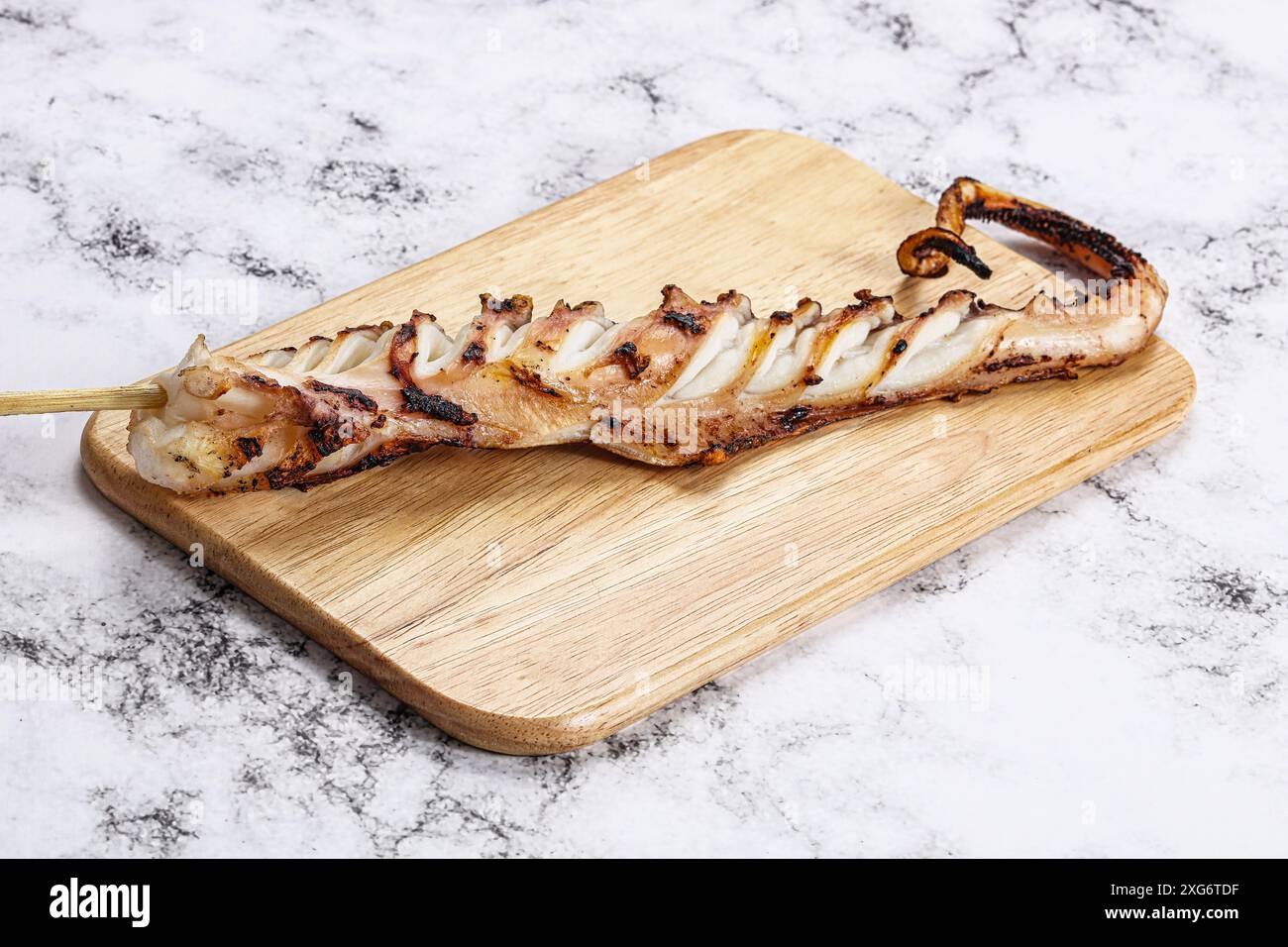 Delicous tasty Grilled octopus tentacle snack Stock Photo - Alamy