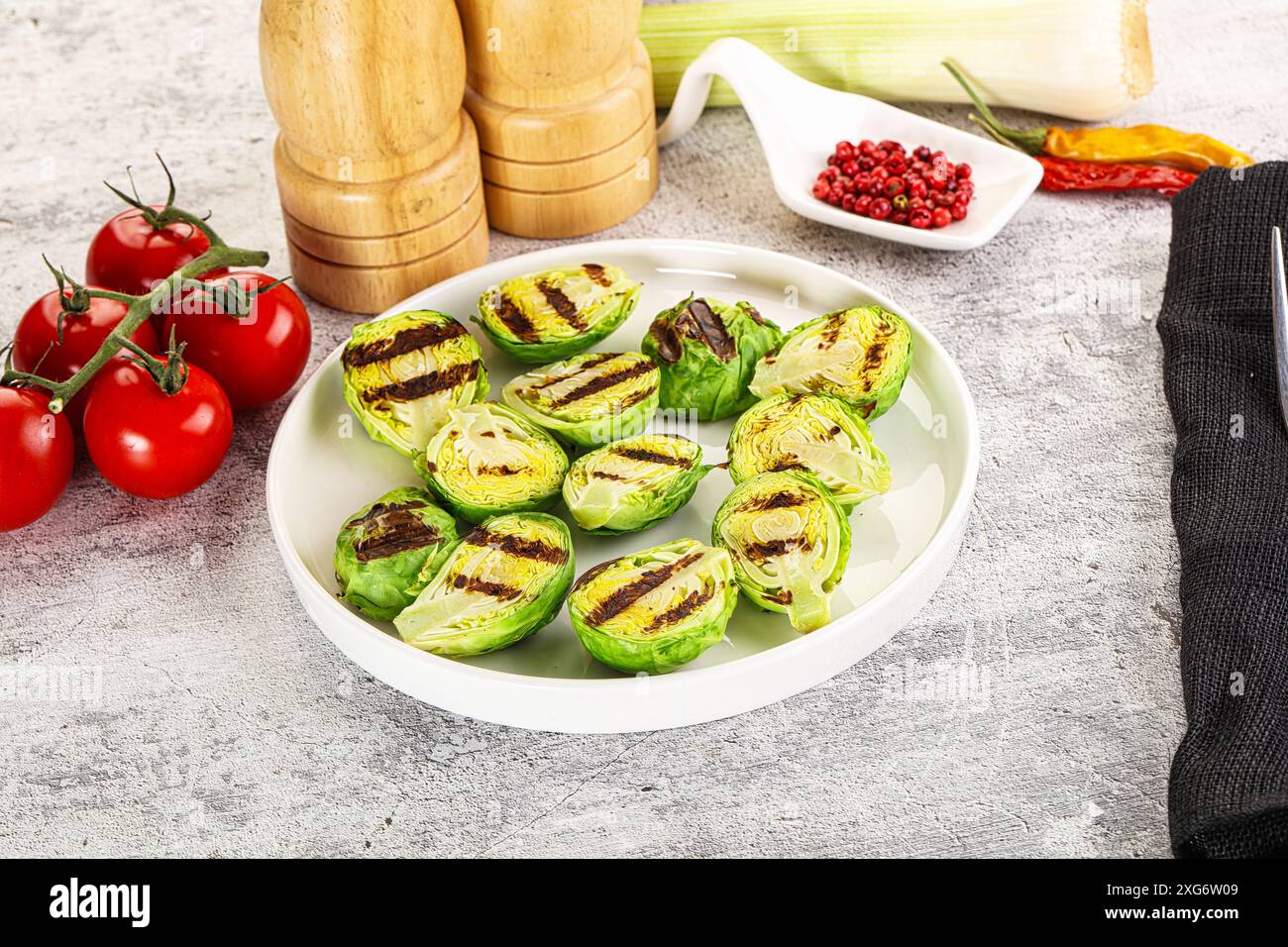 Vegan cuisine Grilled green brussel sprout cabbage Stock Photo - Alamy