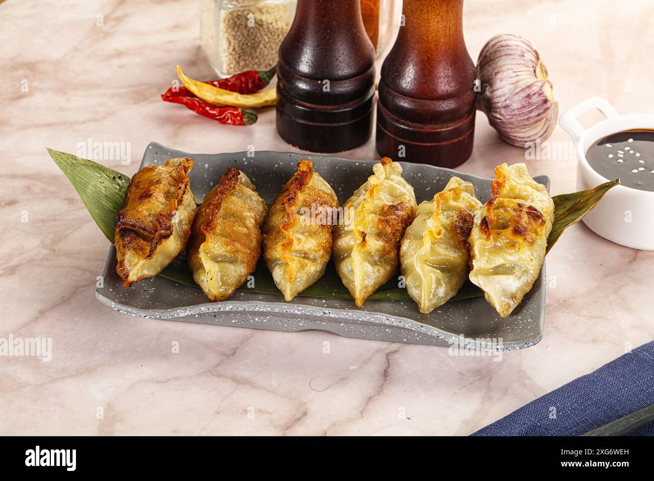 Fried Japanese stuffed dumplings - Gyoza with meat Stock Photo - Alamy
