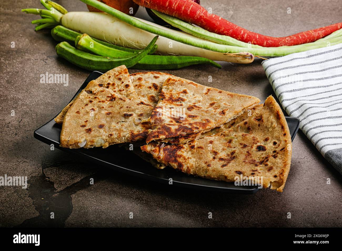 Indian vegetarian Aloo Paratha - bread with potato Stock Photo - Alamy