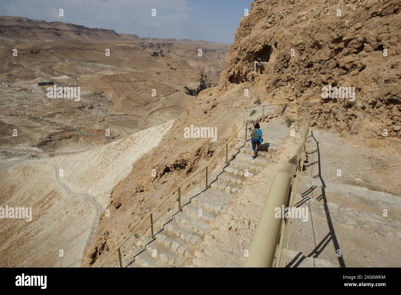 62 year old woman goes up the Masada's ramp built by the Romans so they ...