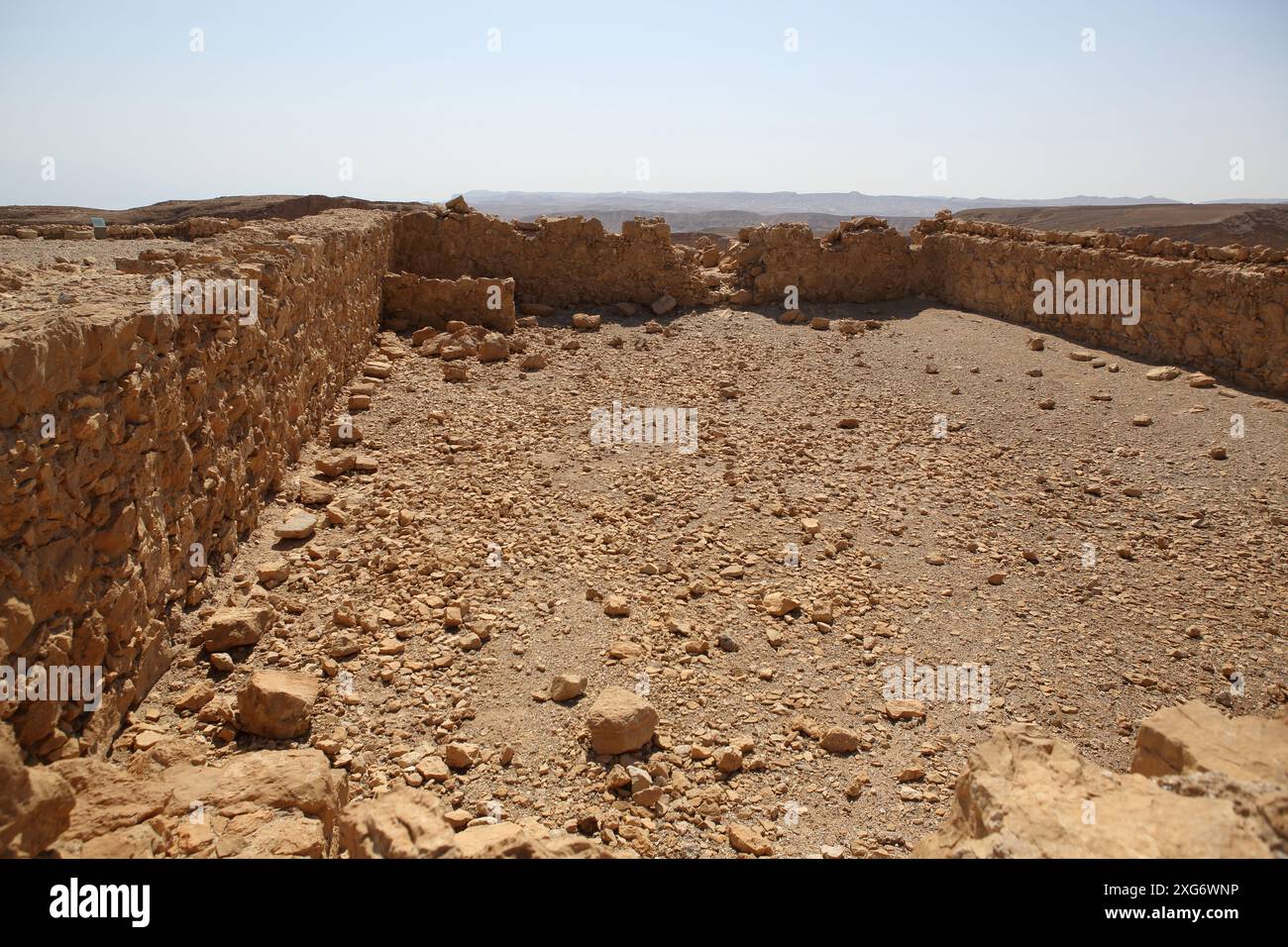 Ruins of a large Swimming Pool built in the desert fort of Masada by ...
