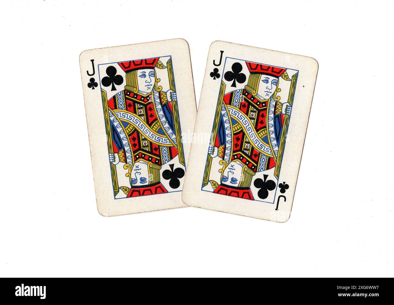 A pair of vintage jack of clubs playing cards on a white background ...