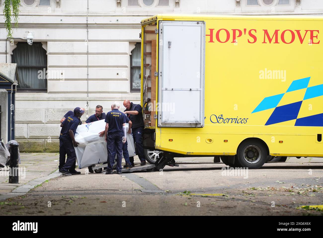 Removal men from the company Bishop's Move, which specialises in ...