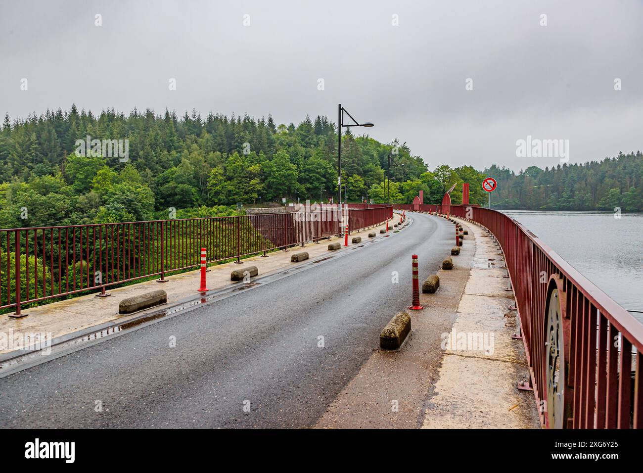 Robertville Dam wall crest with a country road and pedestrian walkway ...