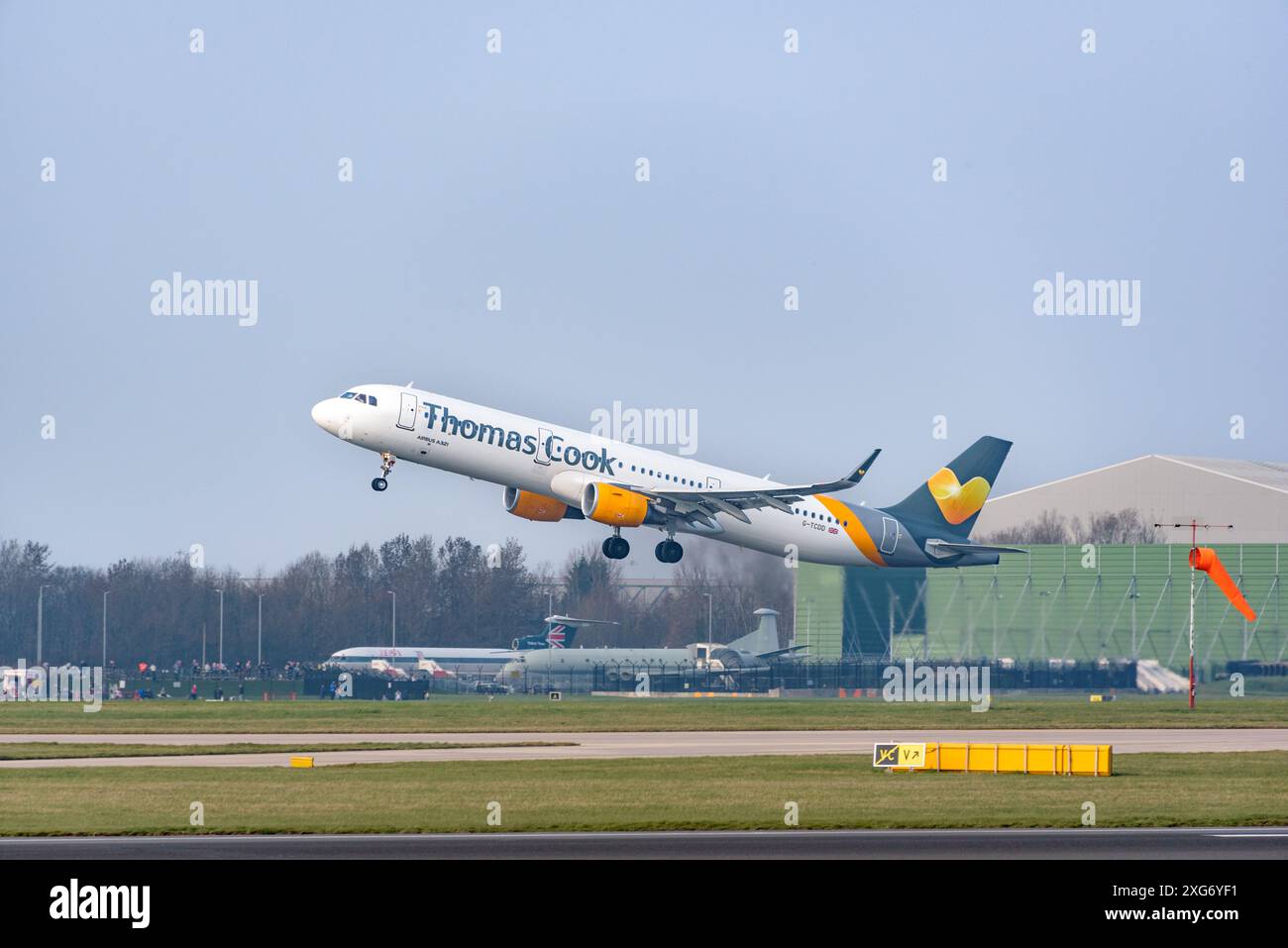 Thomas Cook Airbus A321 taking off from Manchester Airport Stock Photo ...