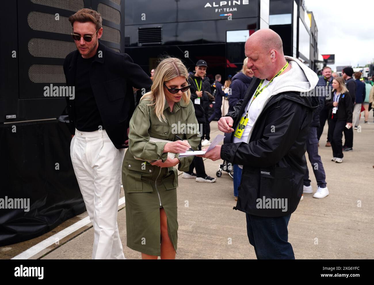 Stuart Broad and Mollie King arriving at Silverstone Circuit ...