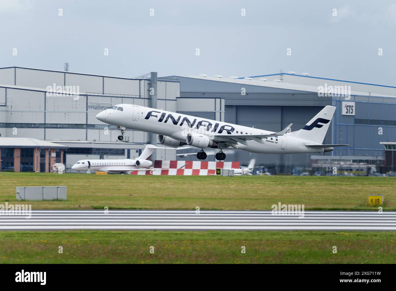 Finnair Embraer E190 departing from Manchester International airport ...