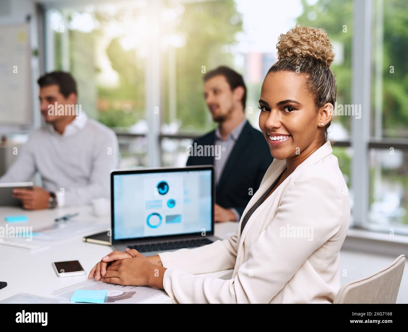 Portrait, meeting and happy business woman in office with data graph ...