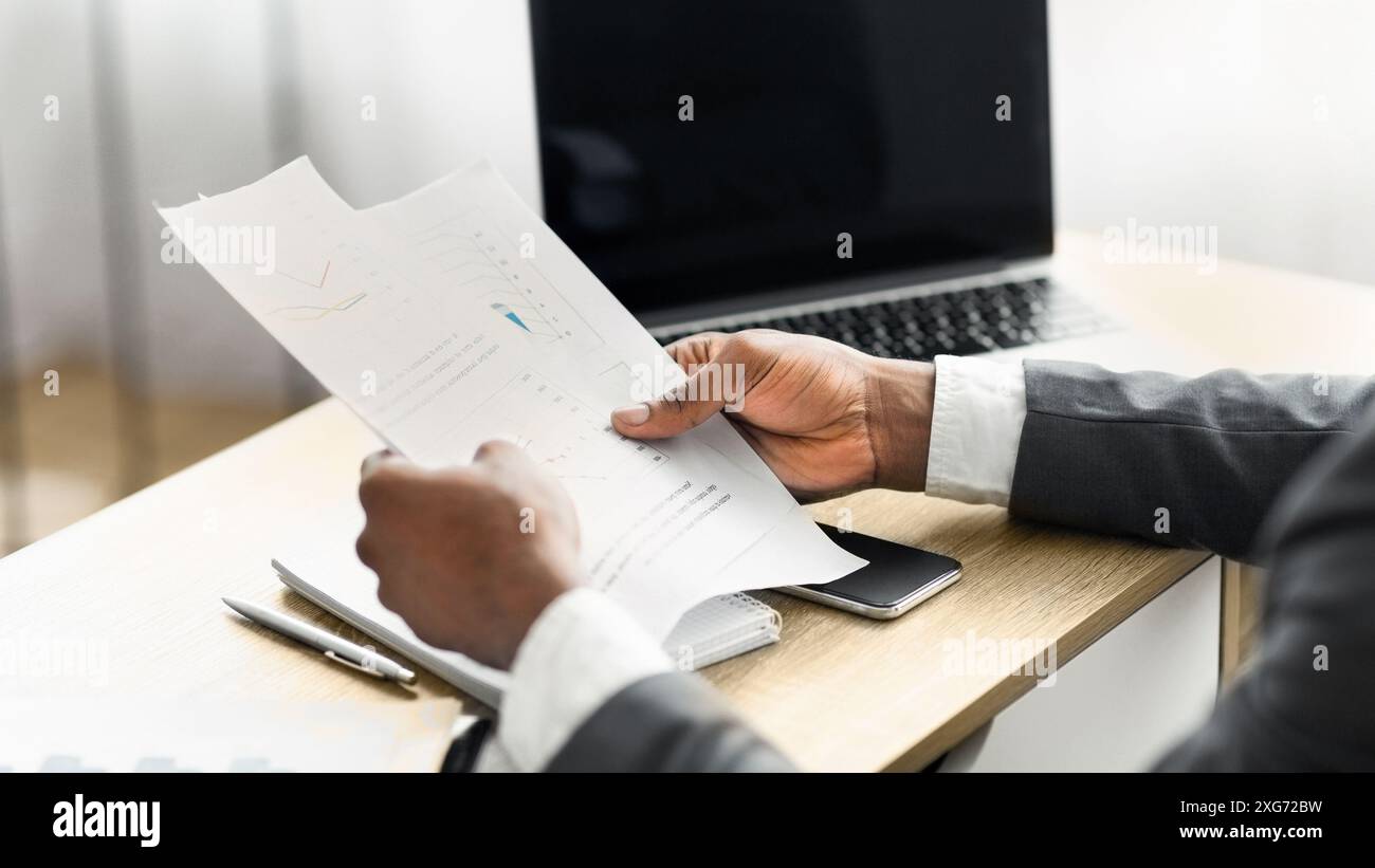 Professional manager reviewing charts hi-res stock photography and ...