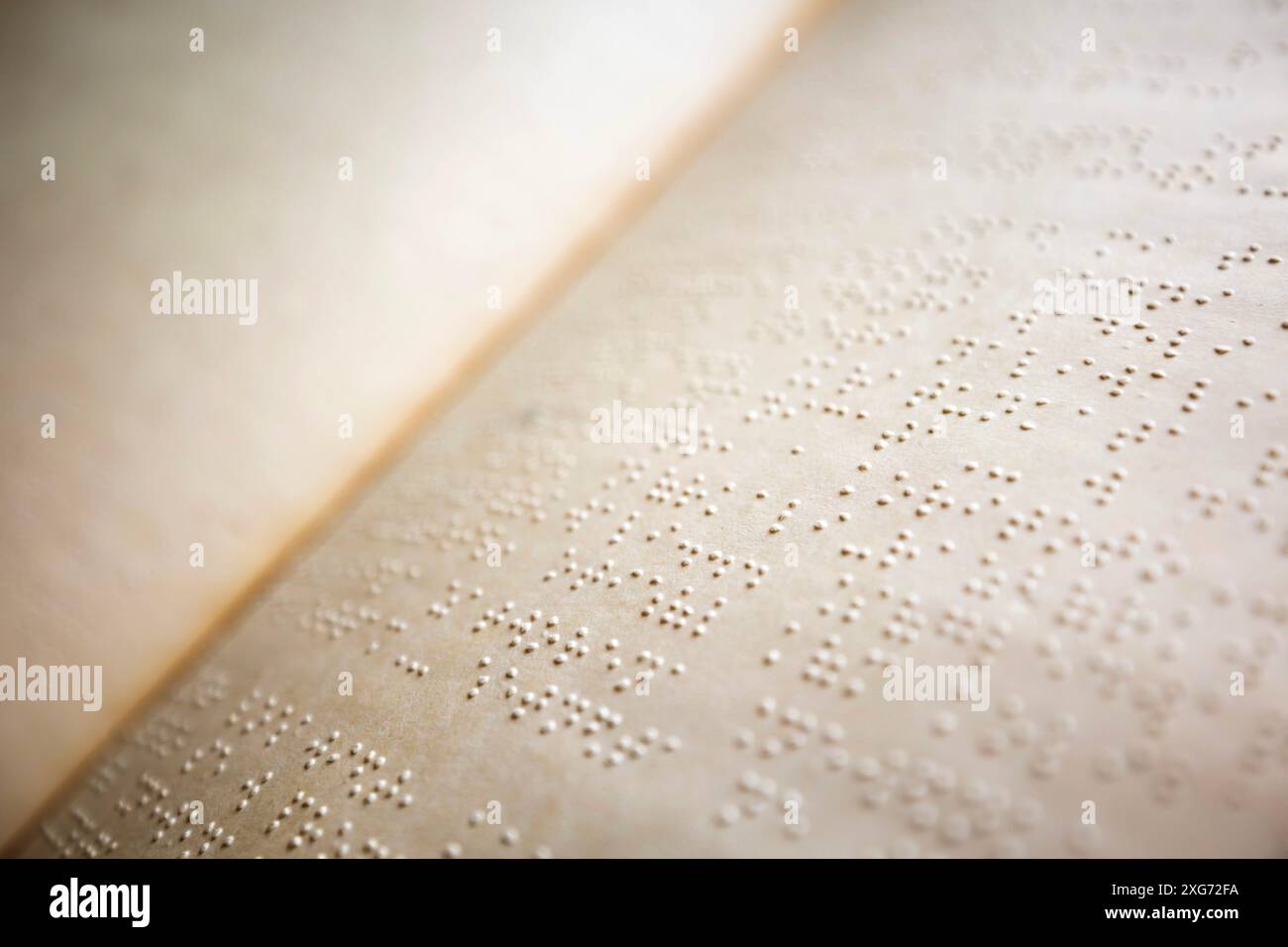 Braille is a system of reading and writing by touch used by the blind ...
