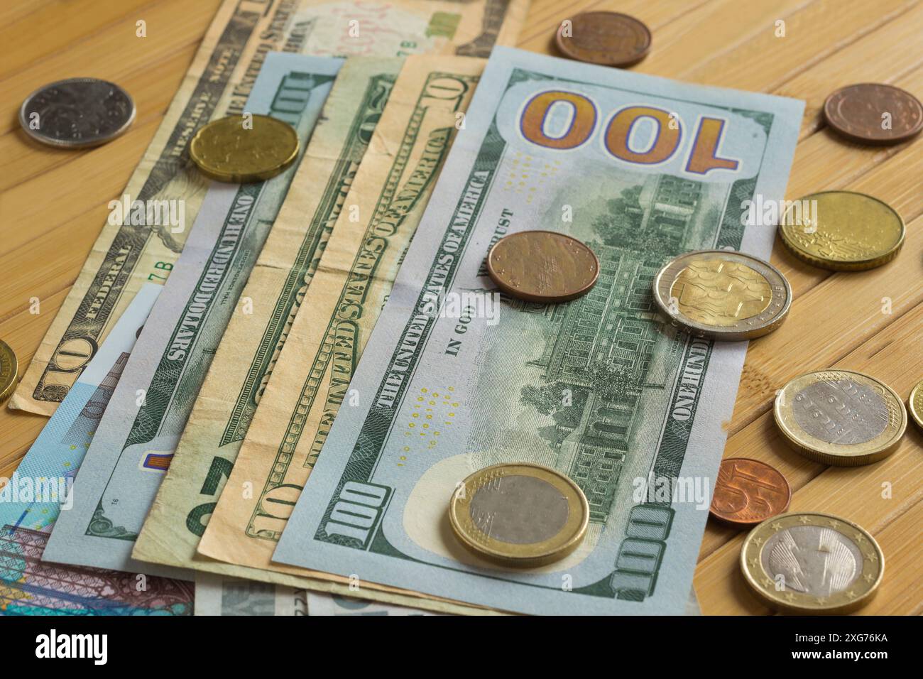 Coins and banknote on the table Stock Photo - Alamy