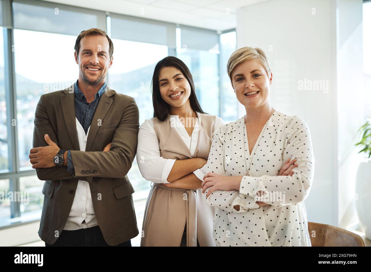 Portrait, business people and arms crossed in office for pride ...