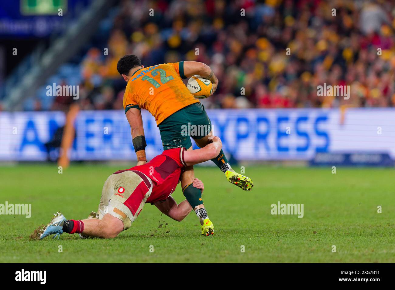 Hunter Paisami of Australia is tackled during the Men's Rugby ...