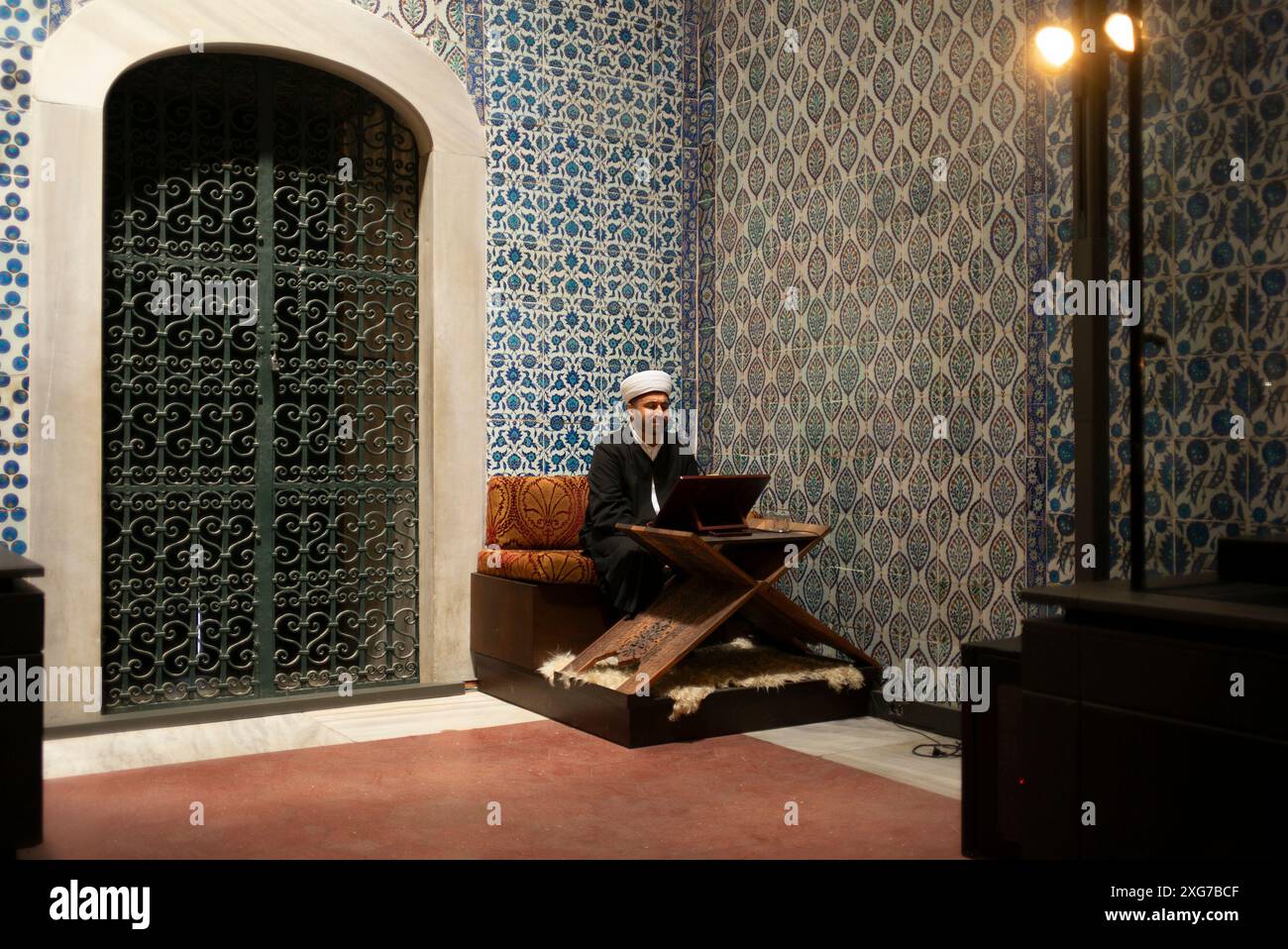 Istanbul, Turkey - May 31, 2024: Imam reciting the Quran in the Privy ...