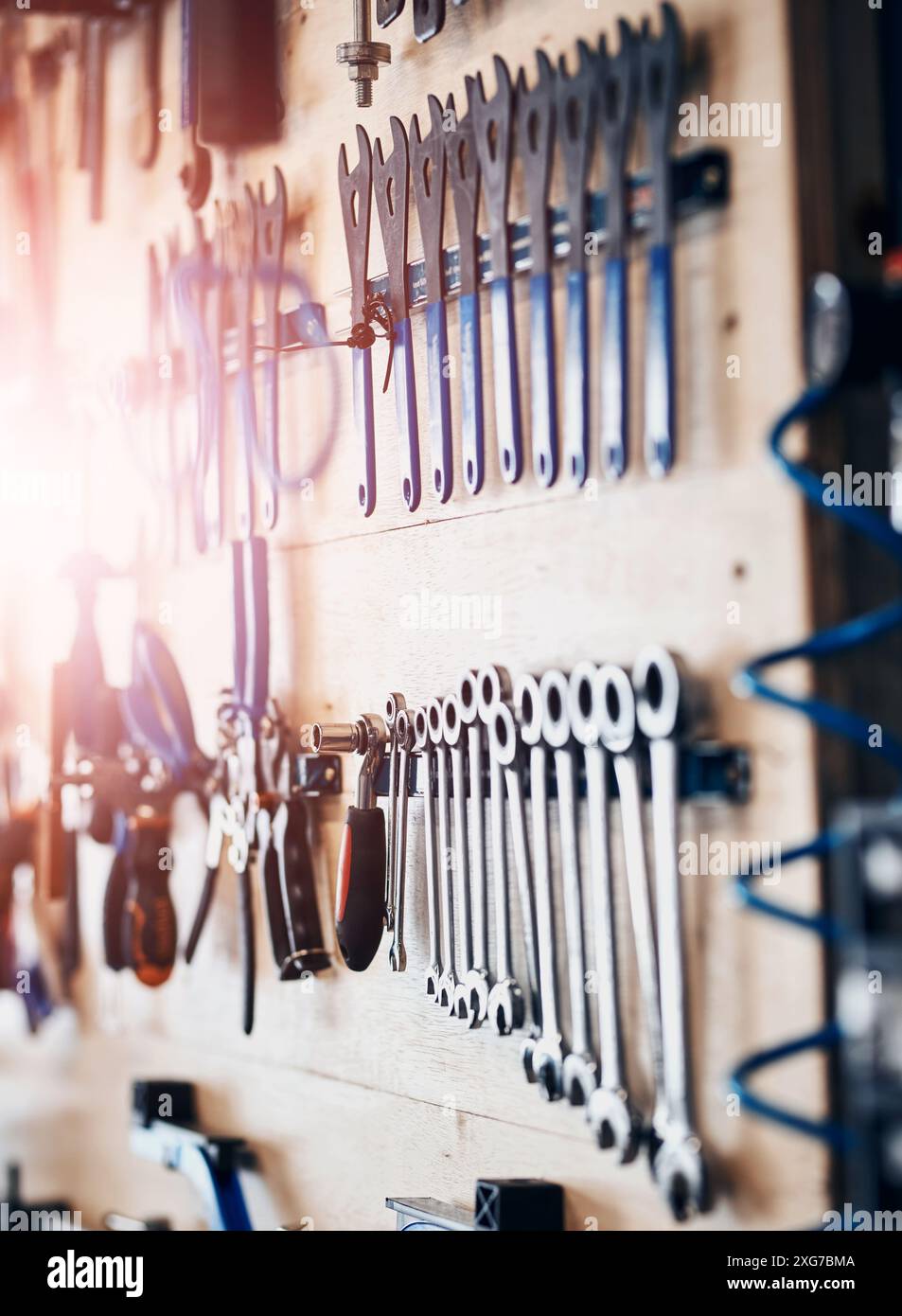 Board, carpentry and tools in workshop, layout and engineering with ...