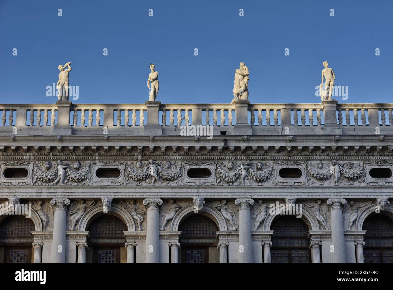 Biblioteca Nazionale Marciana, details of the façade, ornate frieze and ...