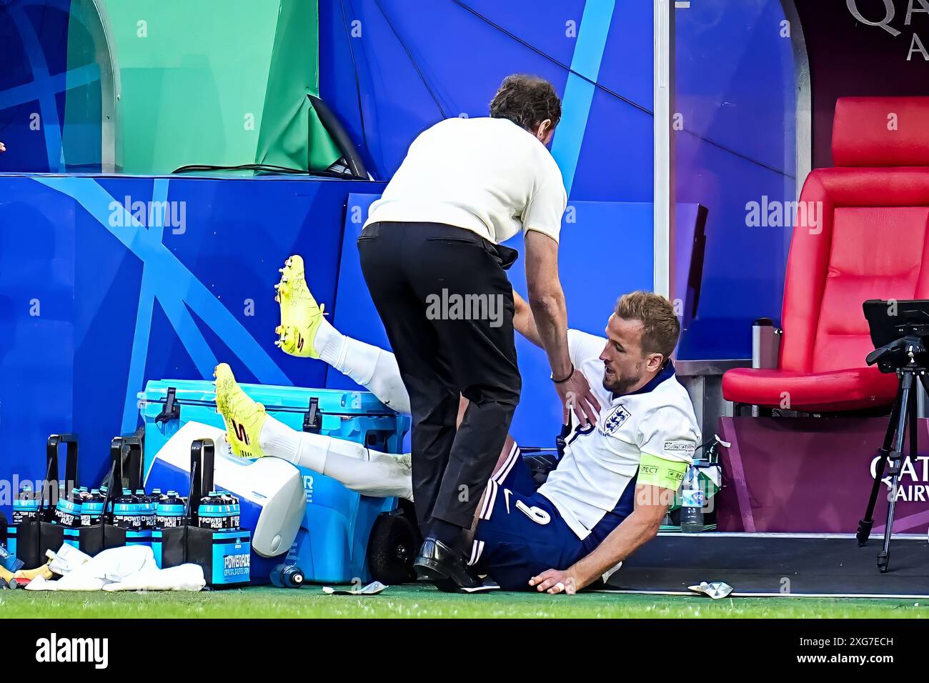 DUSSELDORF, GERMANY - JULY 6: England head coach Gareth Southgate helps ...