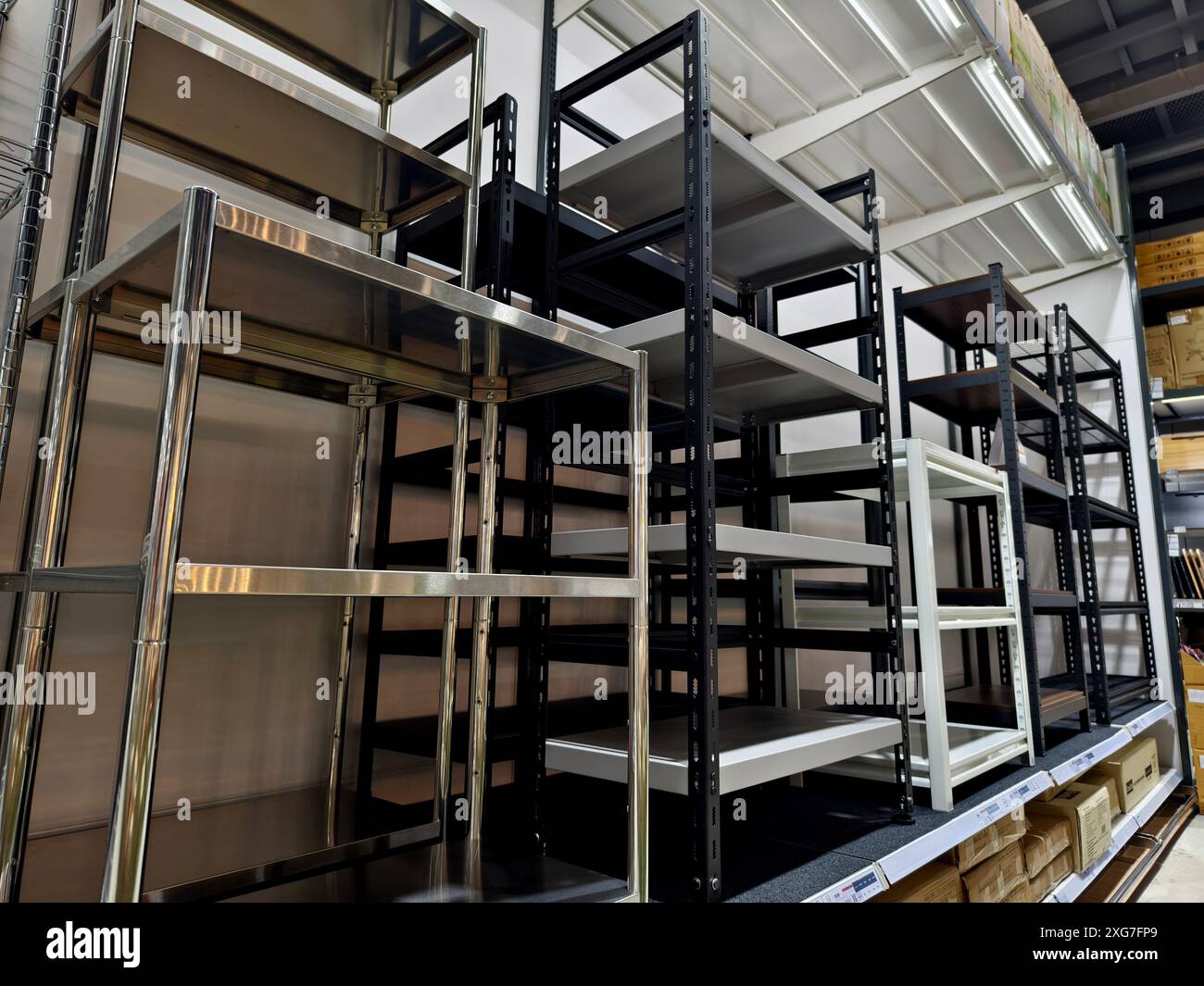 The warehouse has shelves and boxes for storage of materials and ...