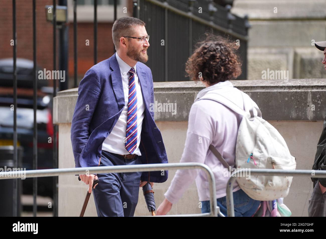 Cabinet Secretary Simon Case leaving the rear entrance of Downing ...