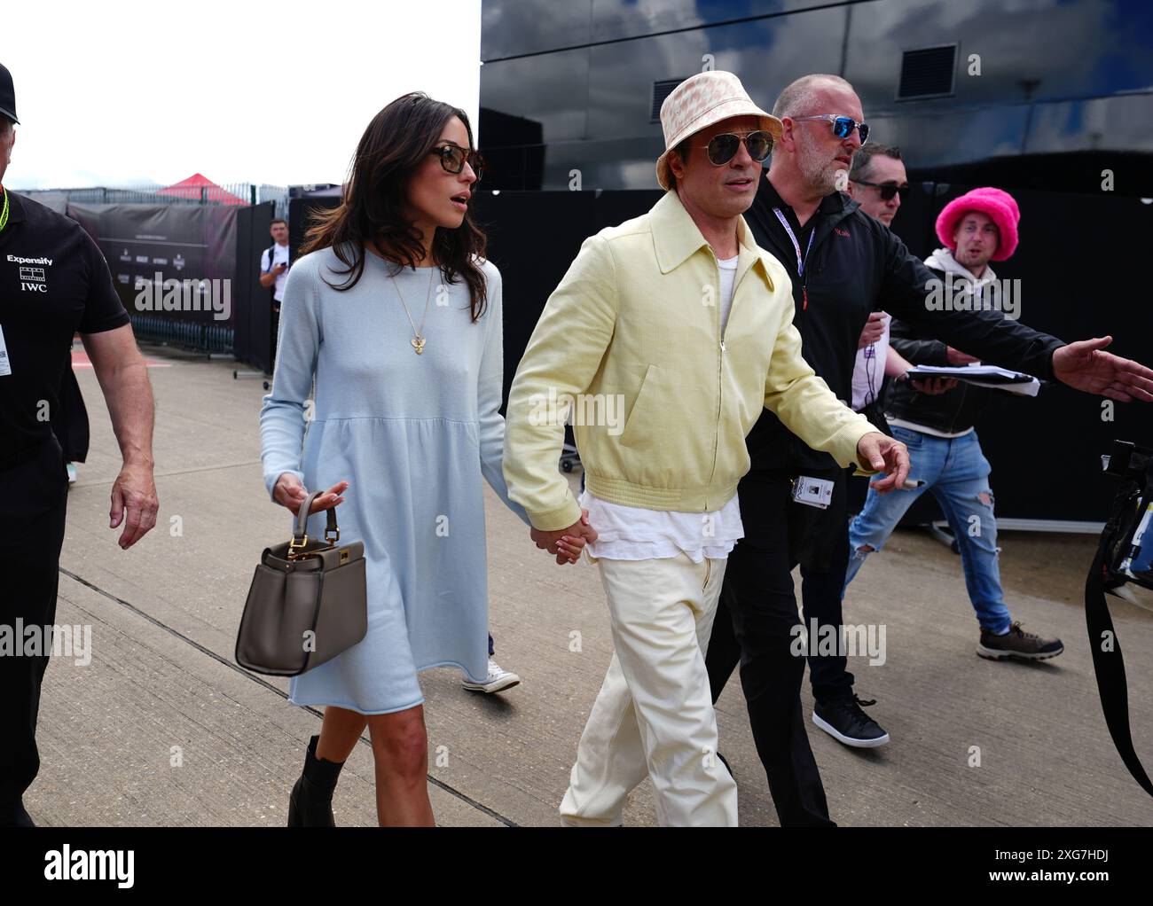 Brad Pitt and his partner Ines De Ramon arrive at Silverstone Circuit ...